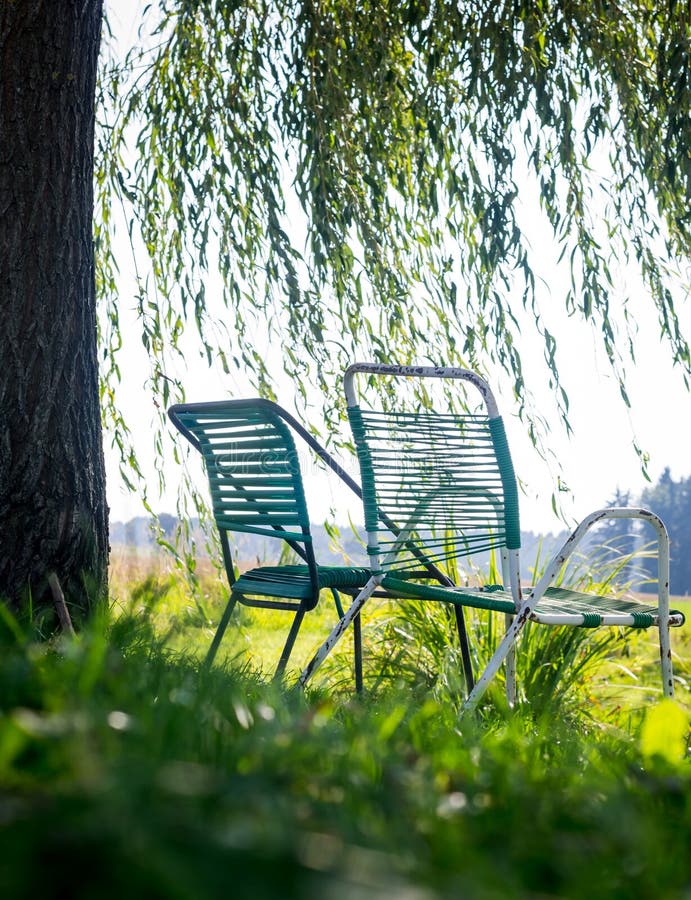 Summer Chairs in the Garden Stock Photo - Image of countryside, leafy ...