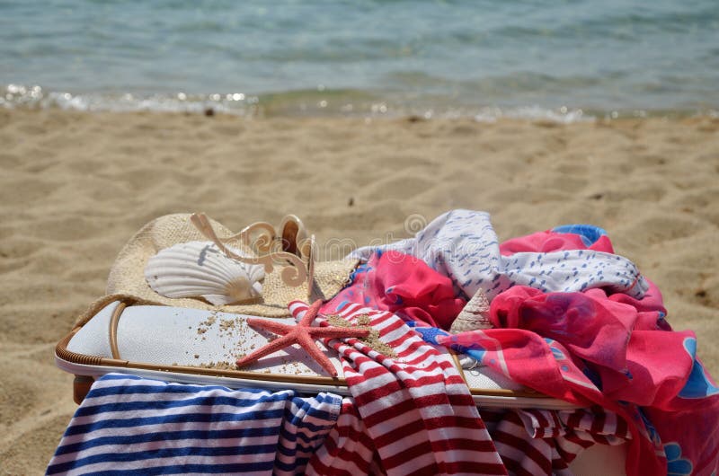 Summer Clothes on Beach stock photo. Image of seasonal - 71053800