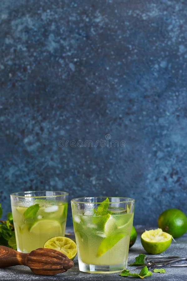 Summer Cold Drink - Mahito with Lime and Mint on a Concrete Dark ...