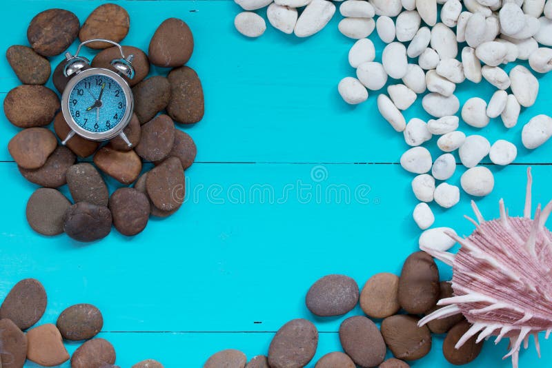 Summer Concept : Seashells and Pebble with Alarm Clock on Wood B Stock ...