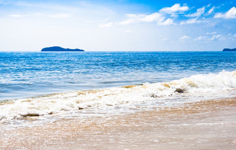 Soft Wave of Blue Ocean on Sandy Beach. Background. Selective Focus ...