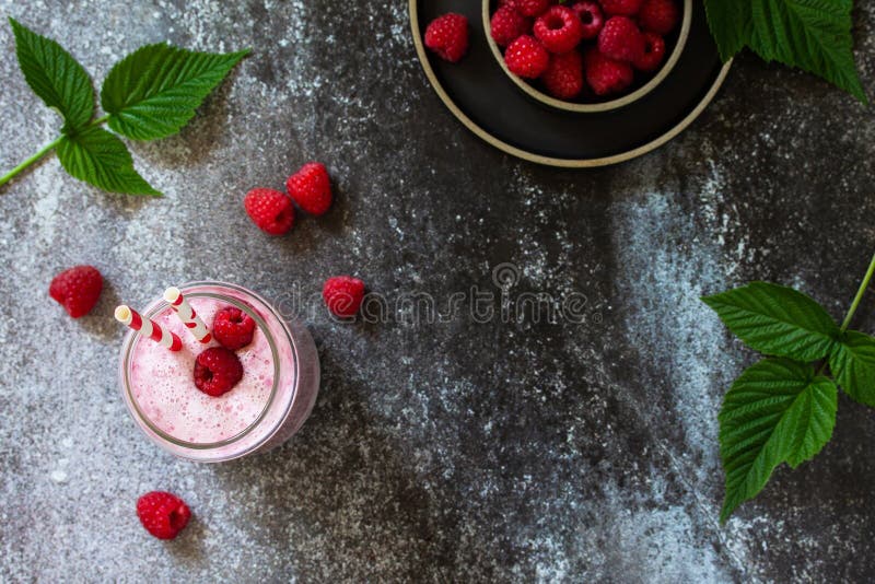 Summer Cool Milkshake. Raspberry Protein Shake in Glass on a Dark ...