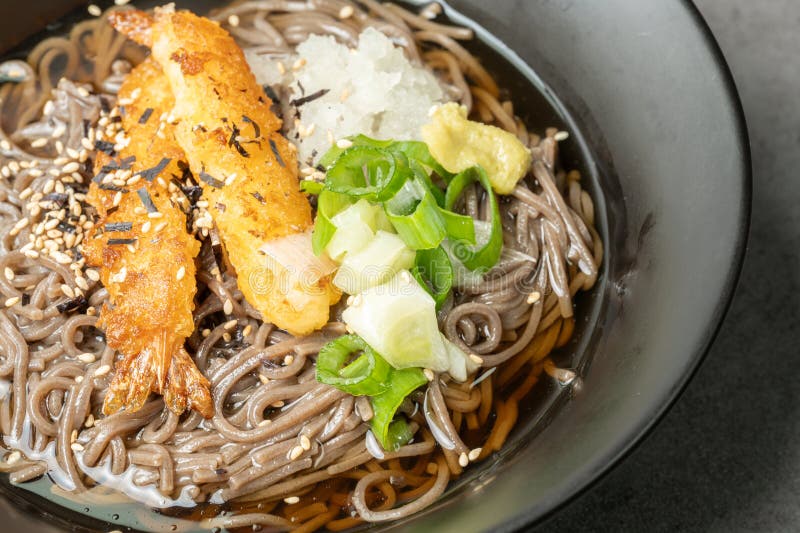 A Summer Dish of Cold Wheat Noodles with Fried Shrimp in a Black Bowl ...
