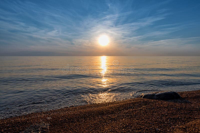 Sunset on the lake stock photo. Image of sunrise, cloud - 287545696