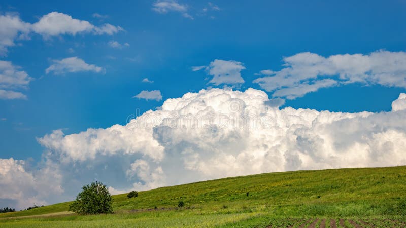 Summer Fields and Big Cumulus Cloud, Mountainous Area Stock Photo ...
