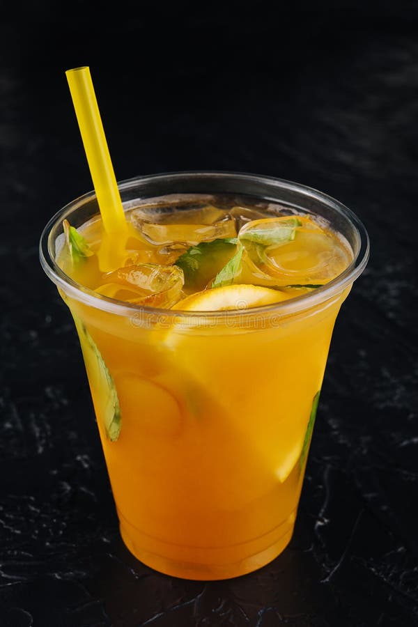 Summer Fresh Cocktail with Straw, Mint and Orange Pieces Stock Photo ...