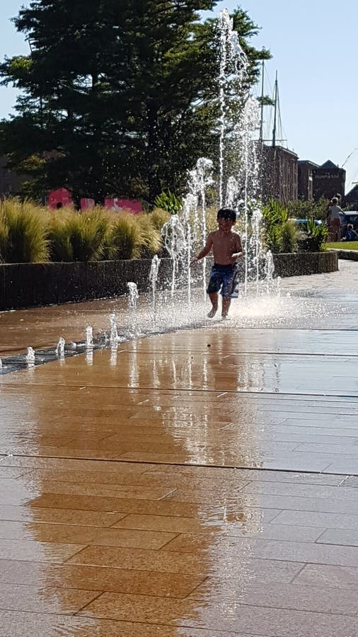 Summer Fun in the Fountains Editorial Image - Image of sunshine ...