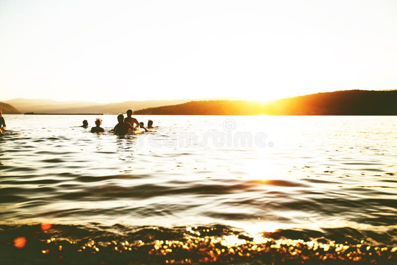 Summer Fun, Friends Enjoy Sunset on the Beach Stock Image - Image of ...