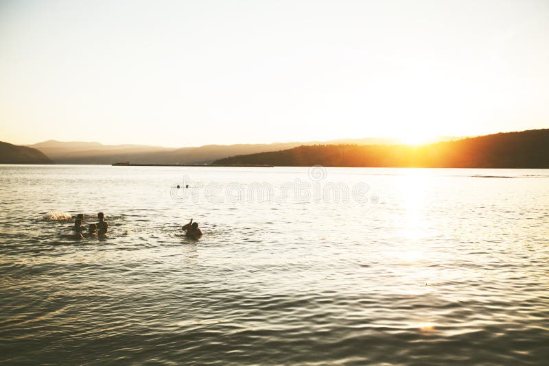 Summer Fun, Friends Enjoy Sunset on the Beach Stock Photo - Image of ...