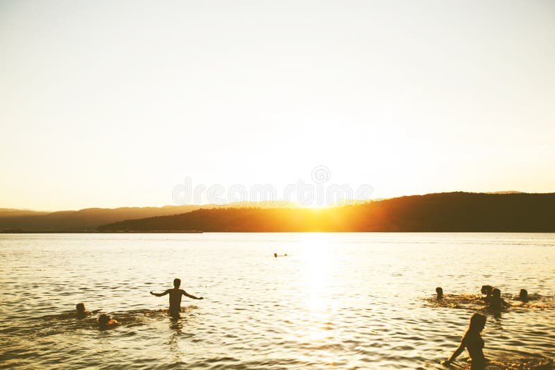 Summer Fun, Friends Enjoy Sunset on the Beach Stock Photo - Image of ...
