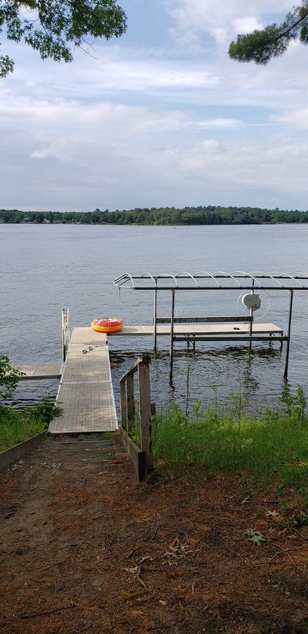 Fun at the lake on dock stock image. Image of girl, smiling - 29208545