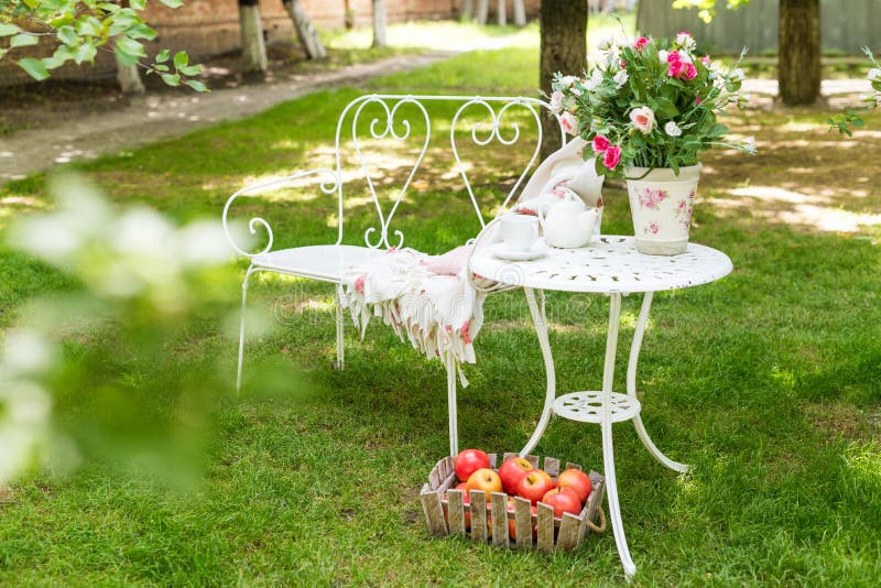 Summer Garden with Tea Party Setting. Outdoor Decorations. Stock Image ...