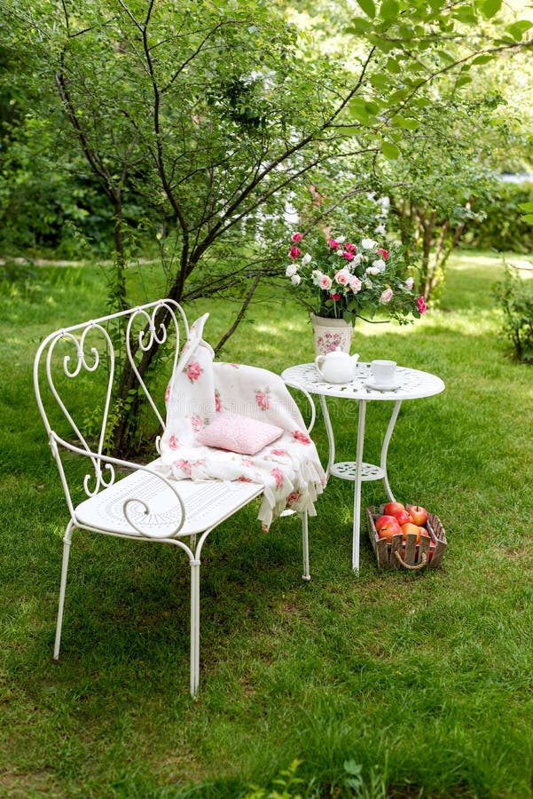 Summer Garden with Tea Party Setting. Outdoor Decorations. Stock Photo ...