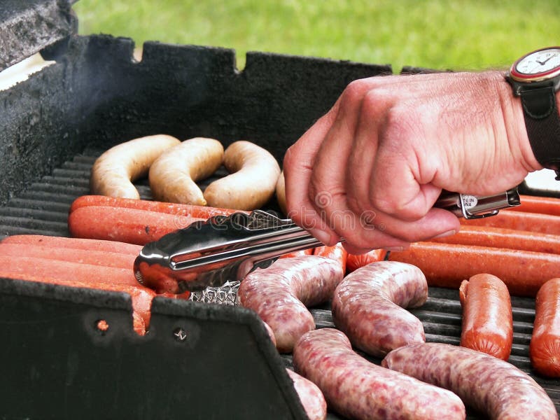 Summer Grilling stock image. Image of male, food, grage - 5390747