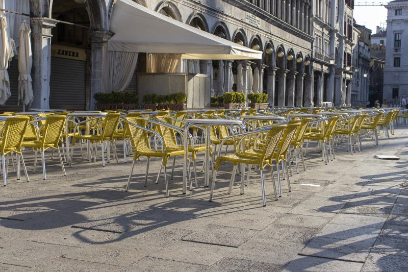 Summer Ground in St. Marks Square: an Empty Yellow Seats in Summer Area ...