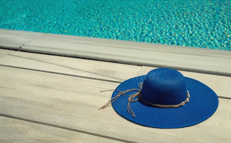 Summer Hat in Front of the Pool. Stock Photo - Image of accessory, pool ...