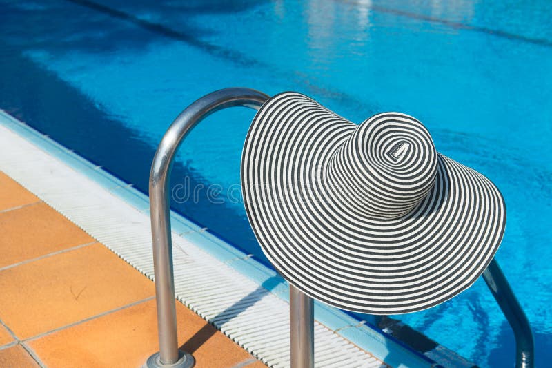 Summer Hat at the Swimming Pool Stock Photo - Image of black, pink ...