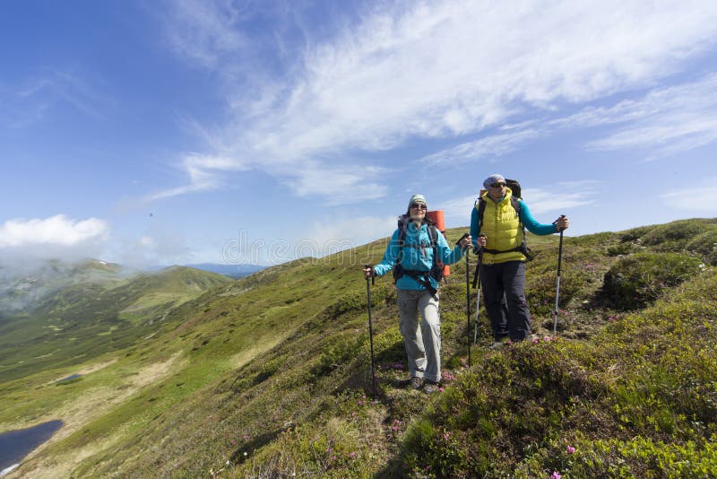 Summer Hiking in the Mountains with a Backpack . Stock Image - Image of ...