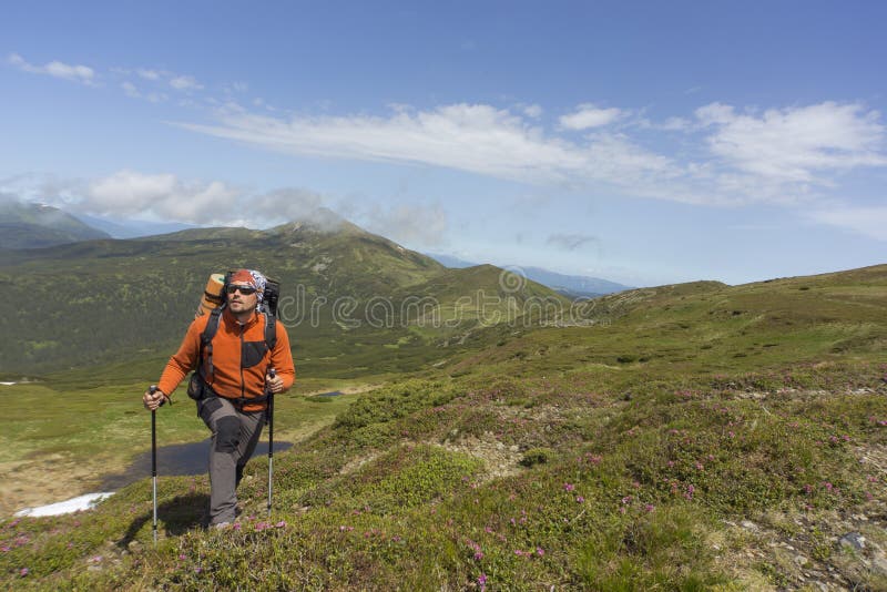 Summer Hiking in the Mountains with a Backpack . Stock Image - Image of ...