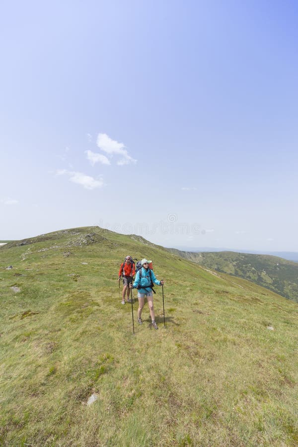 Summer Hiking in the Mountains with a Backpack . Stock Photo - Image of ...
