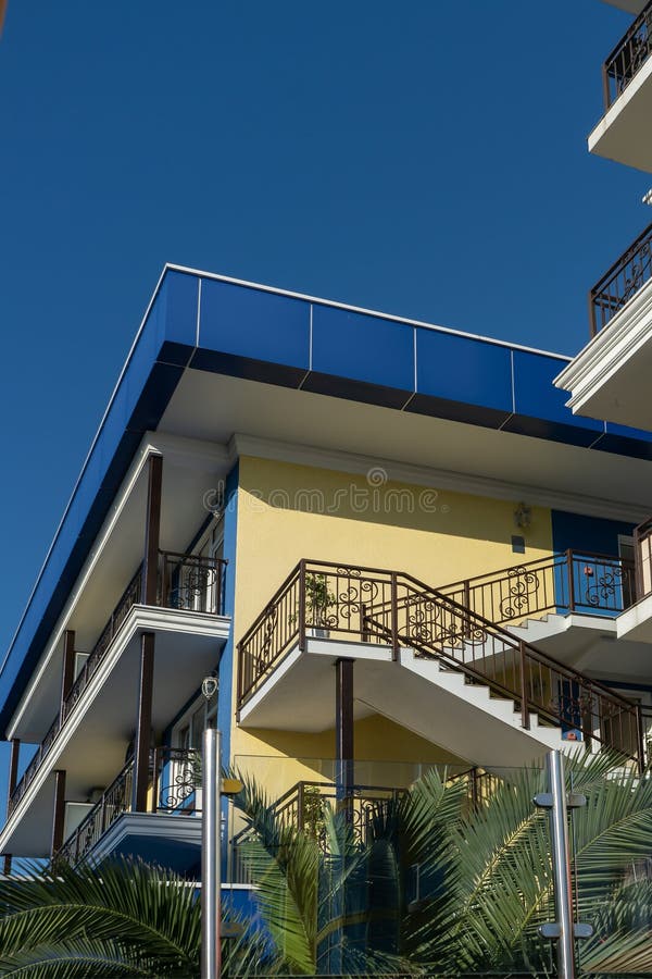 Summer Hotel Building with a Hamlet on the Facade. Stock Image - Image ...