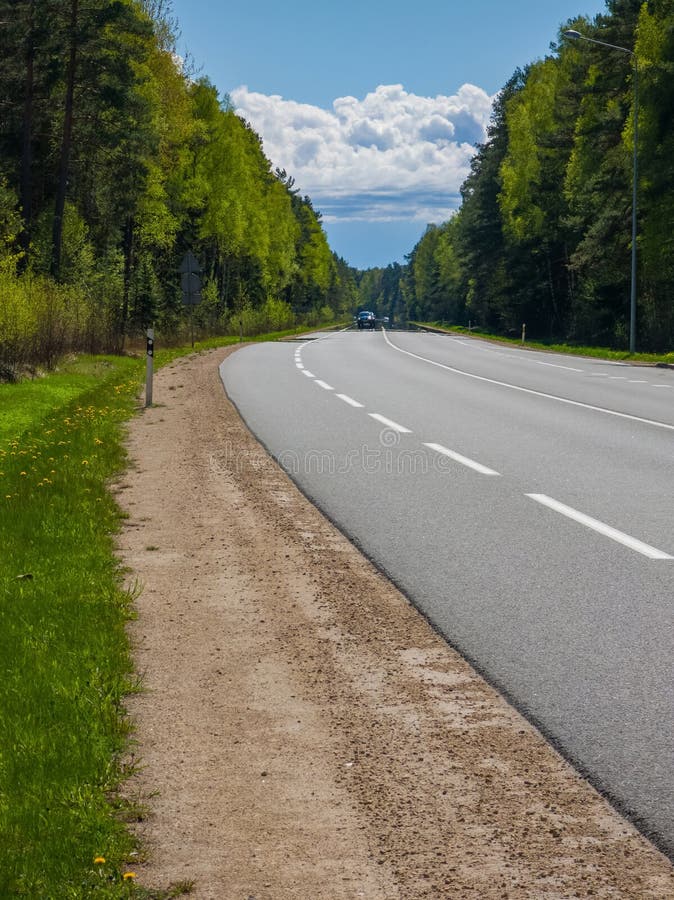 Summer Landscape. Asphalt Road between Green Trees. Clouds in Blue Sky ...