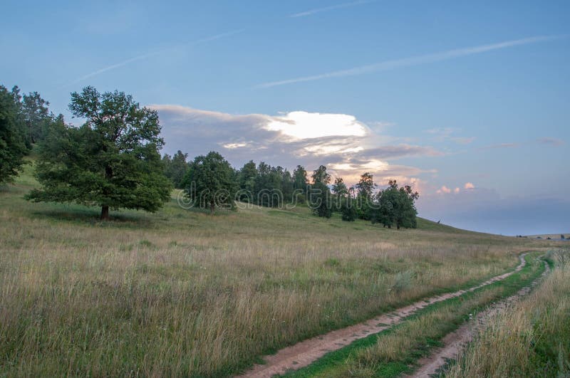 Summer Landscape, Mountainside on the Background of the Setting Sun ...