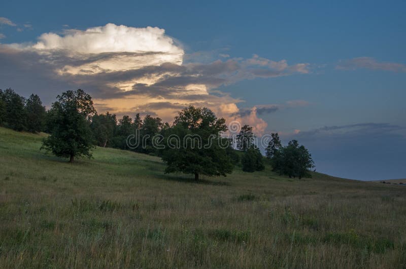 Summer Landscape, Mountainside on the Background of the Setting Sun ...
