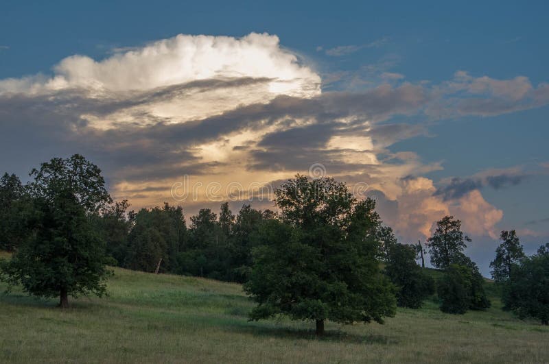 Summer Landscape, Mountainside on the Background of the Setting Sun ...