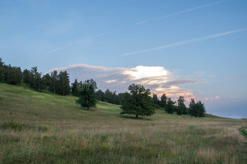 Summer Landscape, Mountainside on the Background of the Setting Sun ...