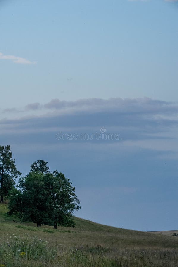 Summer Landscape, Mountainside on the Background of the Setting Sun ...