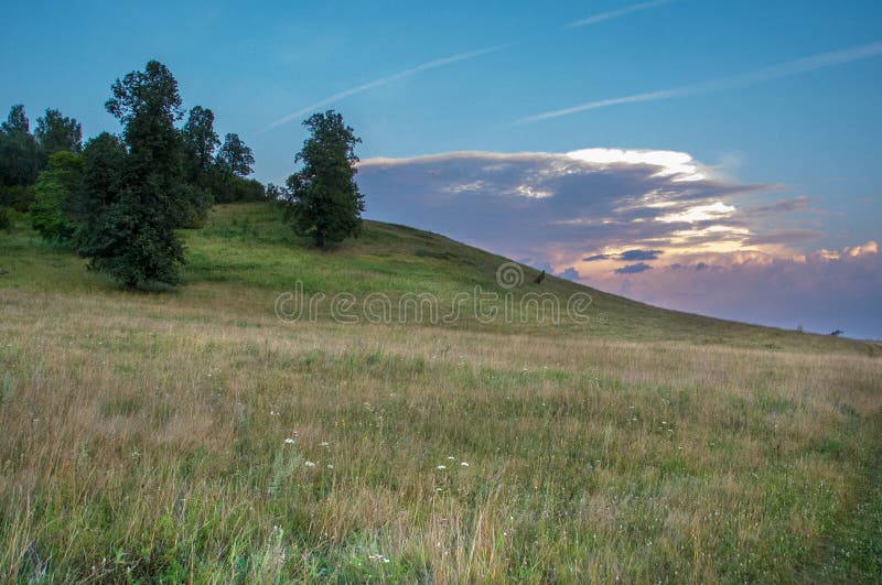 Summer Landscape, Mountainside on the Background of the Setting Sun ...
