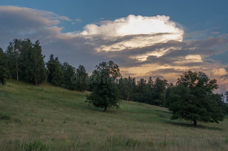 Summer Landscape, Mountainside on the Background of the Setting Sun ...