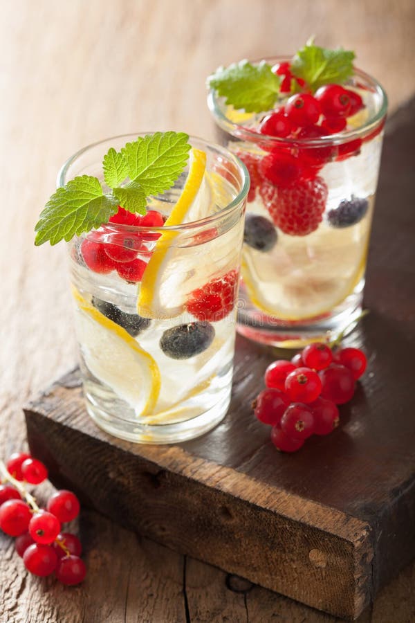 Summer Lemonade with Berry and Lemon Stock Photo - Image of lemon ...