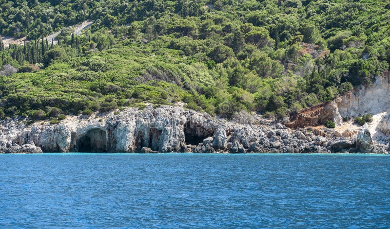 Summer Mediterranean Coast with Caves in Rocks Stock Photo - Image of ...