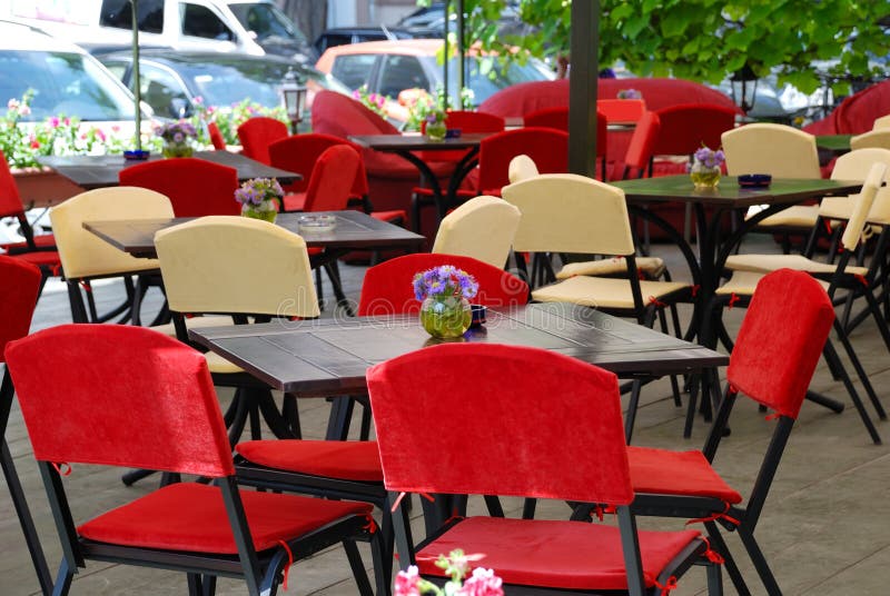Open Air Street Cafe Outdoor - White Chairs And Tables, Decorated With ...