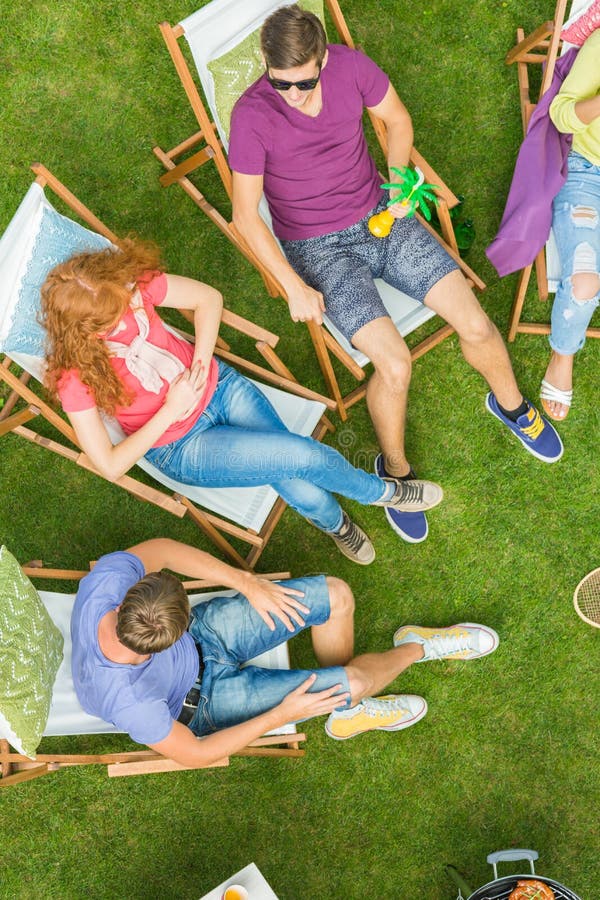 Summer party with friends stock image. Image of grass - 96088341