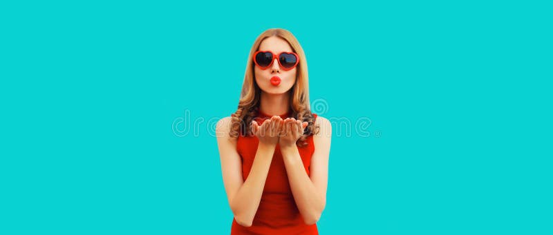 Summer Portrait Of Beautiful Young Woman Model Blowing Her Lips Sending