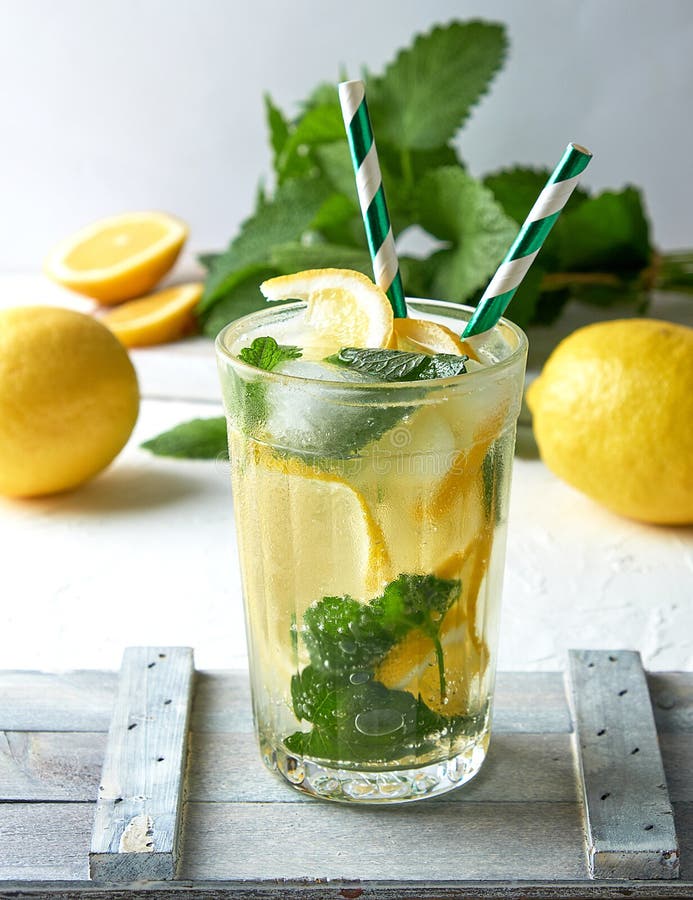 Summer Refreshing Drink Lemonade with Lemons, Mint Leaves, Lime in a ... Summer Refreshing Drink Lemonade with Lemons, Mint Leaves, Lime in a ...