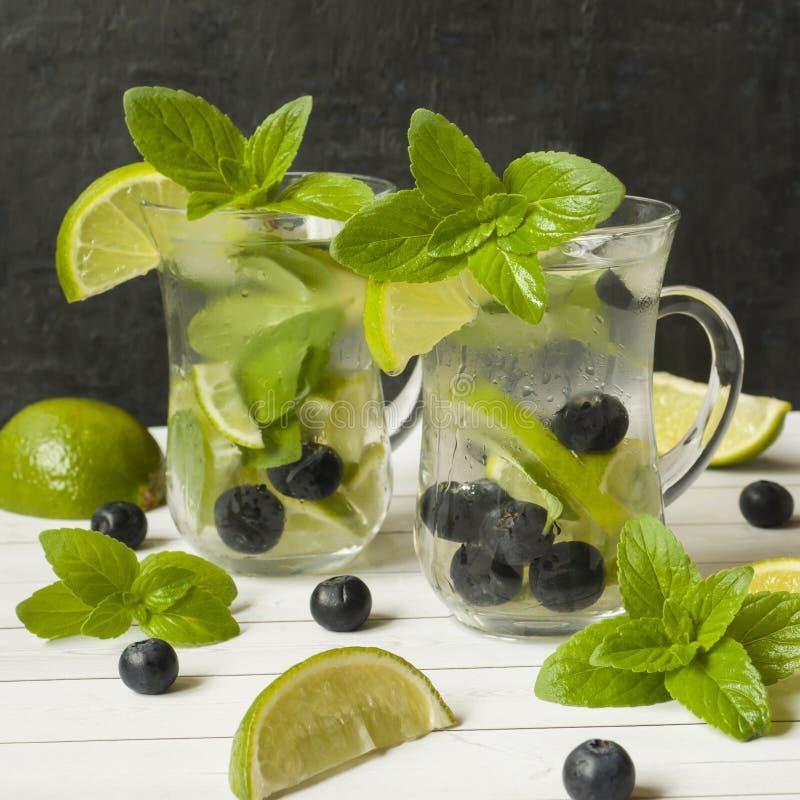 Summer Refreshing Drinks Lemonade or Cocktail Mojito with Lime Fresh ...