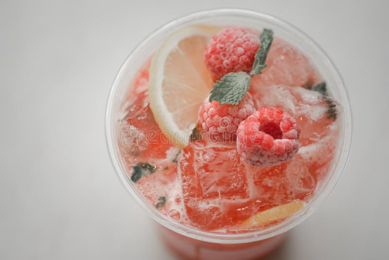 Summer Refreshments in Plastic Glass Decoration with Slice Lemon and ...