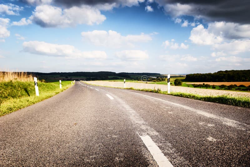 Summer Road with Cloudy Sky Stock Image - Image of roadway, nature ...