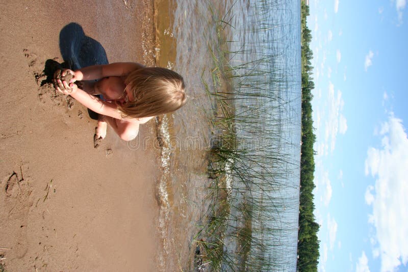 Summer sand stock photo. Image of lake, toddler, shoreline - 1073650