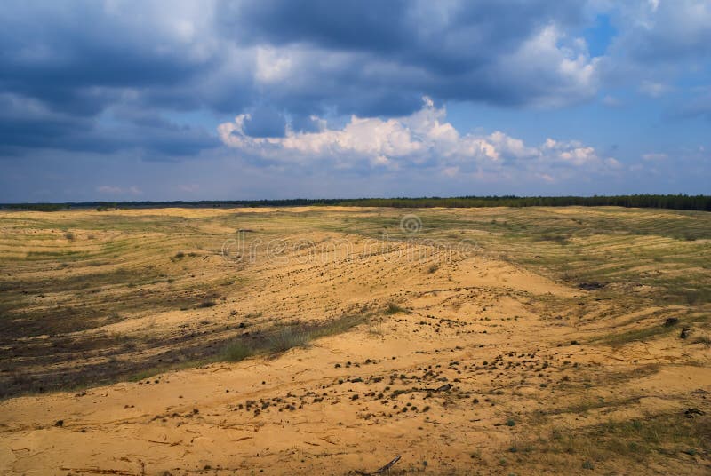 Sandy Desert Under a Dense Cloudy Sky Stock Image - Image of sandy ...