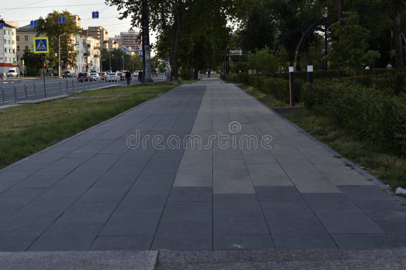 Summer Sidewalk and Park in the City. Beautiful Sidewalk and Narrow ...
