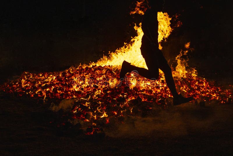 Summer Solstice Celebration Jumping into the Fire. Burning Flames Stock ...