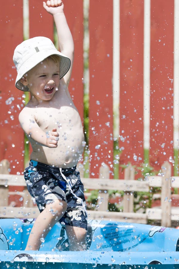 Summer splash stock photo. Image of water, backyard, child - 5626008