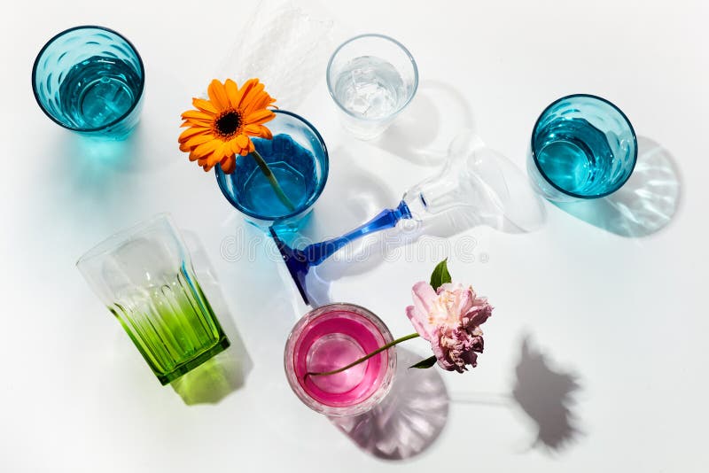 Summer Still Life Scene. Crystal Glasses with Long Harsh Shadows. Stock ...