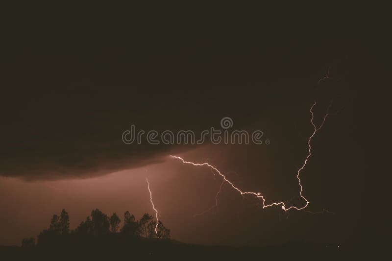 Summer Storms, Thunder and Lightning Over the Trees Stock Photo - Image ...