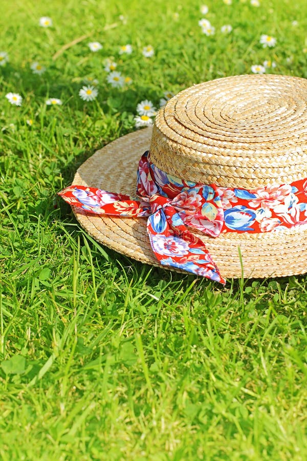 Summer Straw Hat on the Grass Stock Photo - Image of season, headdress ...